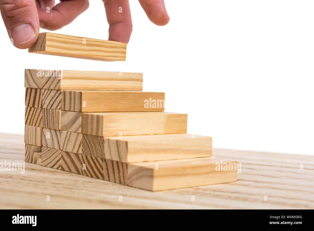 Step by step to shape your own life presented with a wooden staircase ...