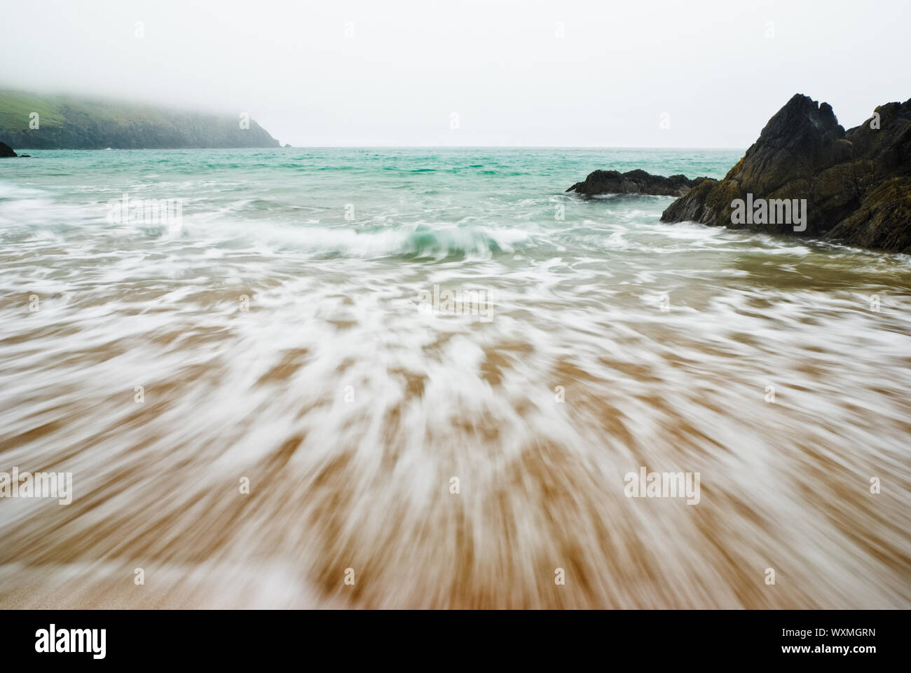 Foggy weather over Atlantic Ocean in Slea Head, Dingle Peninsula ...
