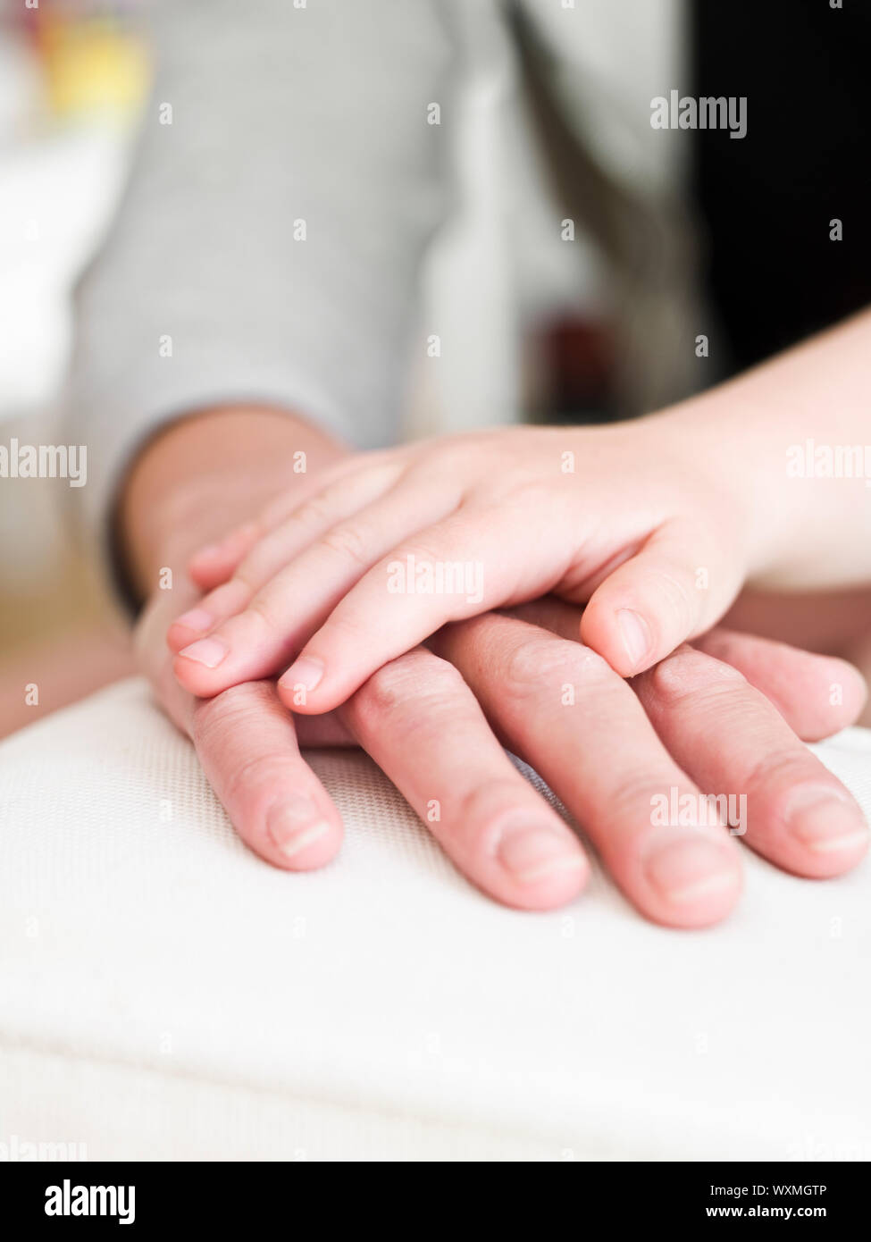 Adults and Childs hand Stock Photo - Alamy