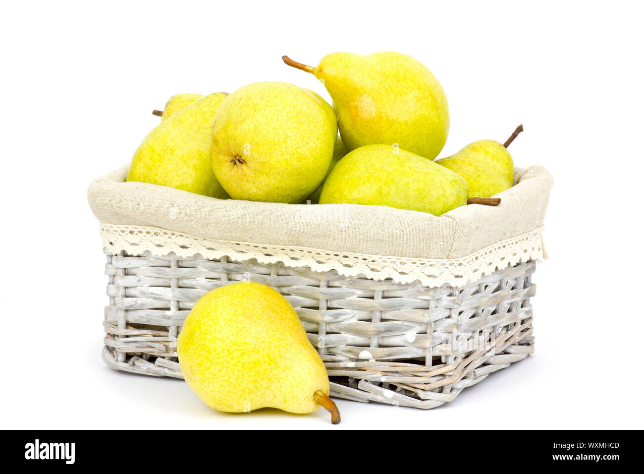Green pears in basket Cut Out Stock Images & Pictures - Alamy
