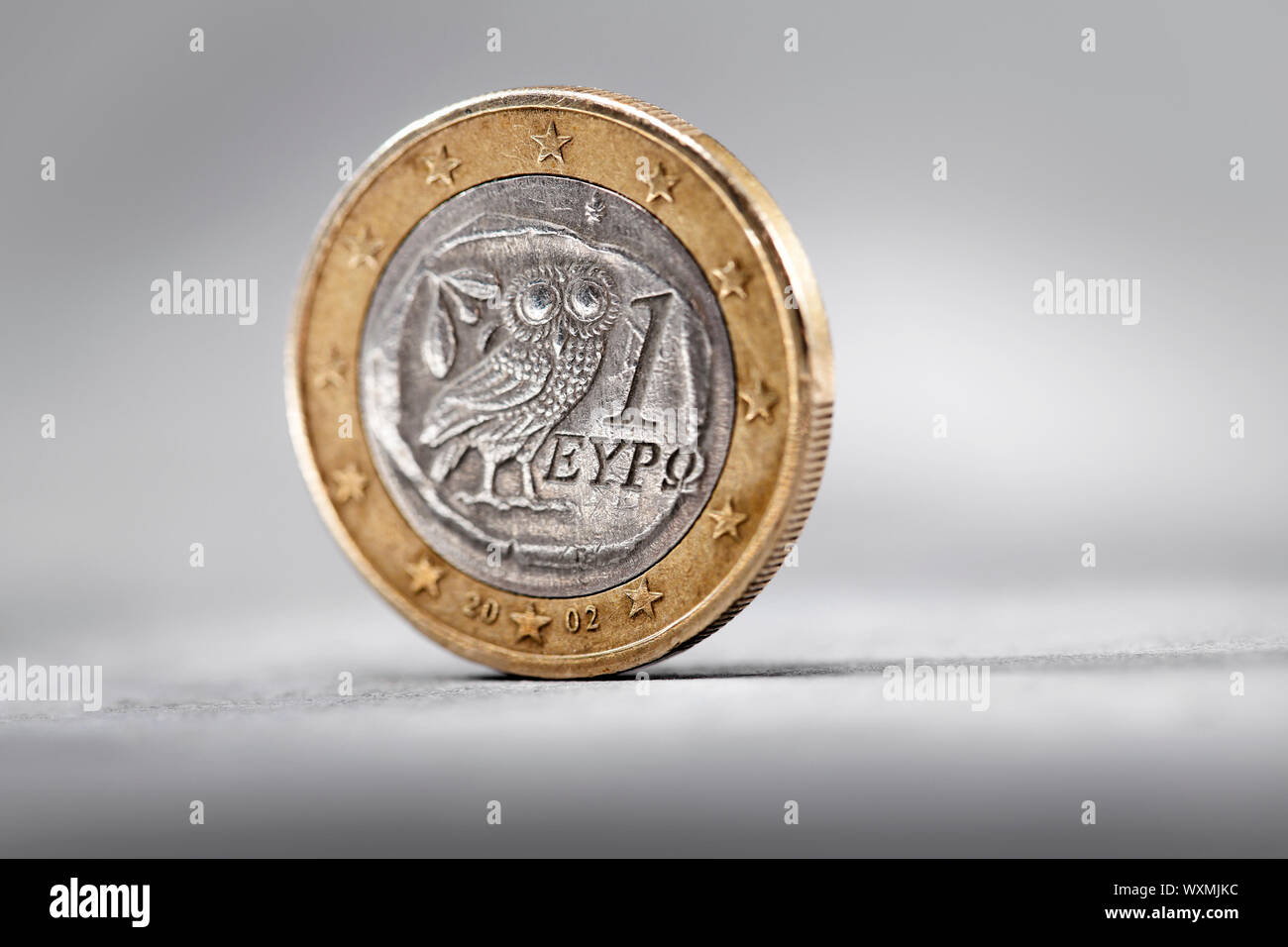 Greek 1 Euro Coin on grey background Stock Photo - Alamy