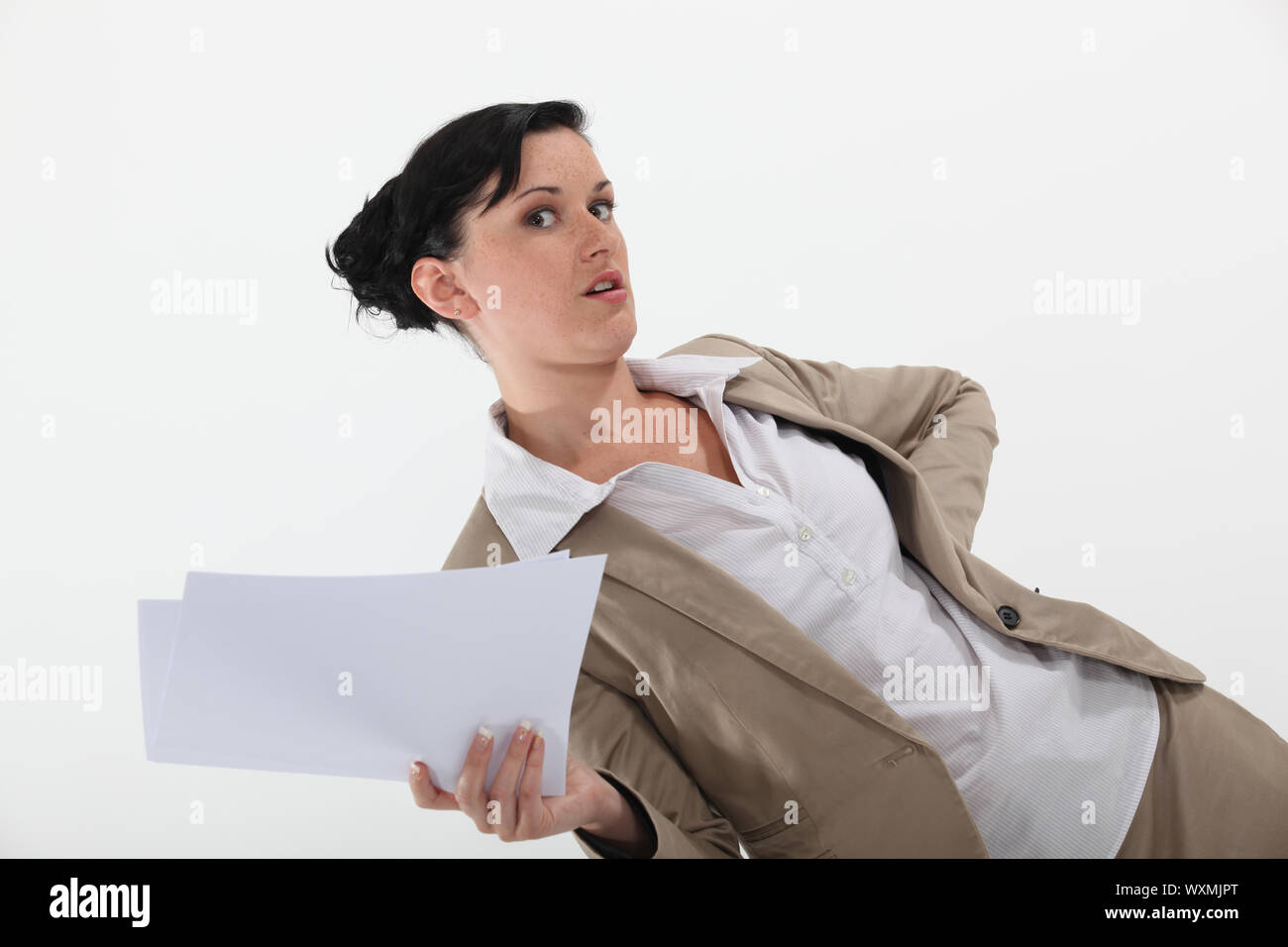 Secretary holding paperwork Stock Photo - Alamy