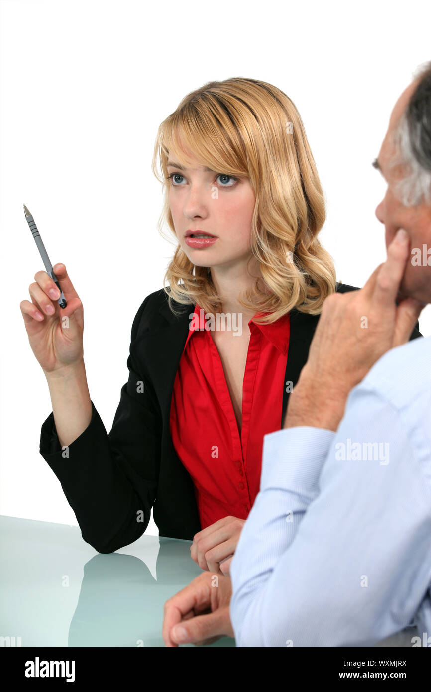 Female employee and boss having a meeting Stock Photo - Alamy