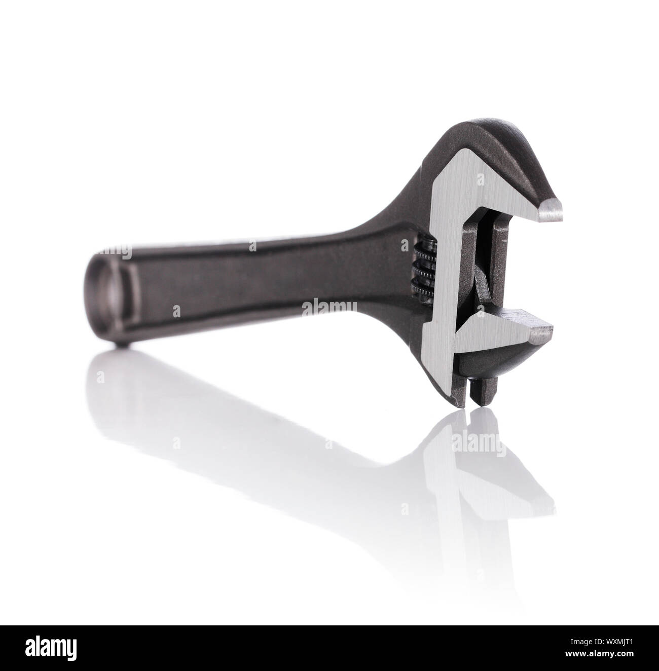 A new adjustable spanner isolated on white with reflection Stock Photo ...