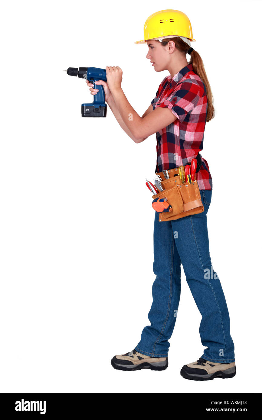Woman with drill Stock Photo - Alamy