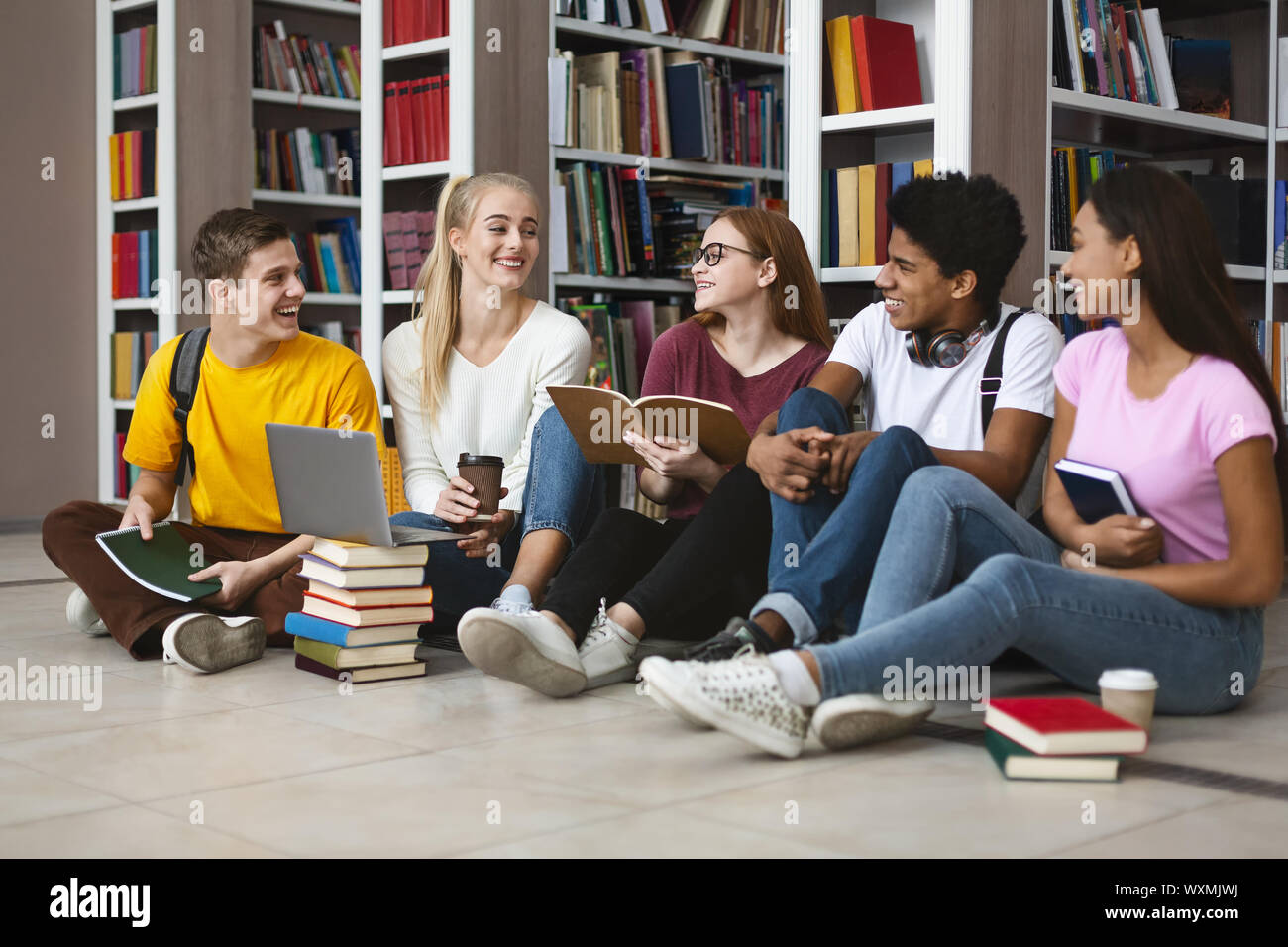 Group college friends sitting chatting hi-res stock photography and ...