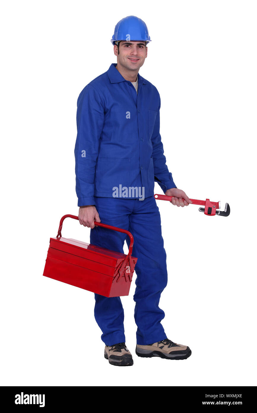 Worker with a wrench and toolbox Stock Photo - Alamy