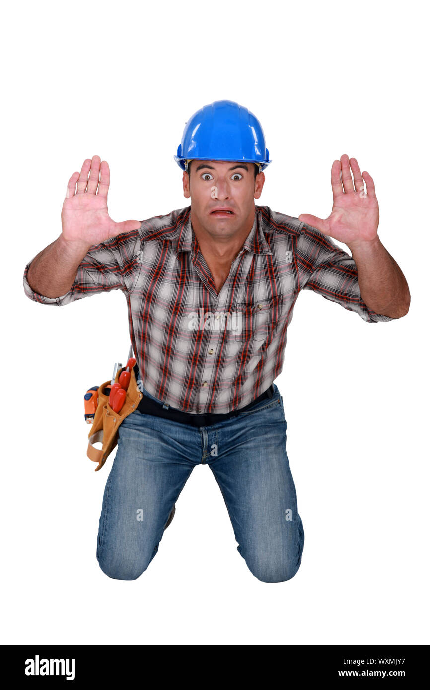 Trapped construction worker Stock Photo - Alamy