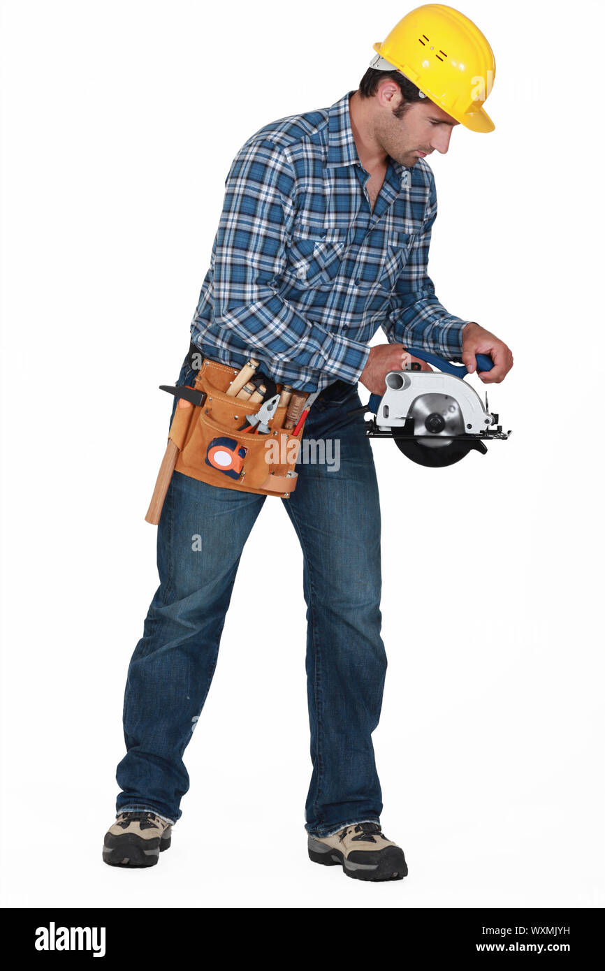 Worker with a disc cutter Stock Photo - Alamy