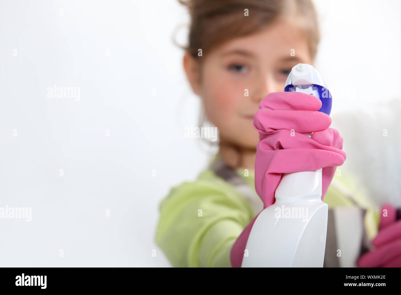 Young girl cleaning Stock Photo - Alamy