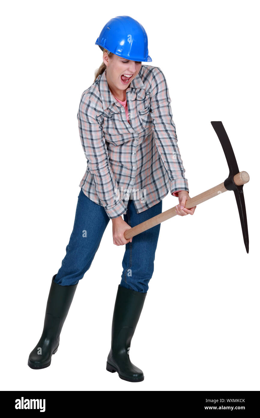 Woman holding pick axe hi-res stock photography and images - Alamy