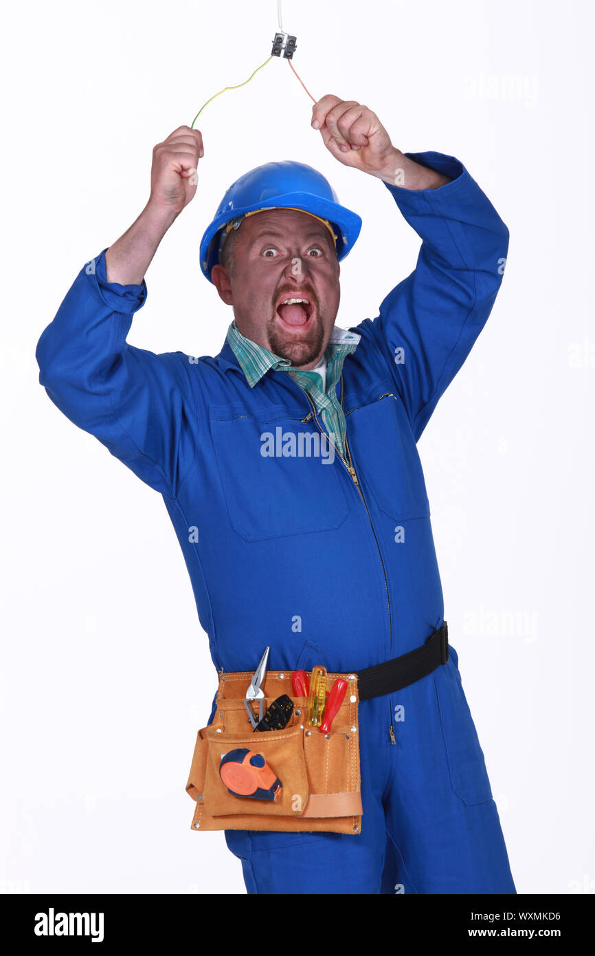 Man being electrocuted Stock Photo - Alamy