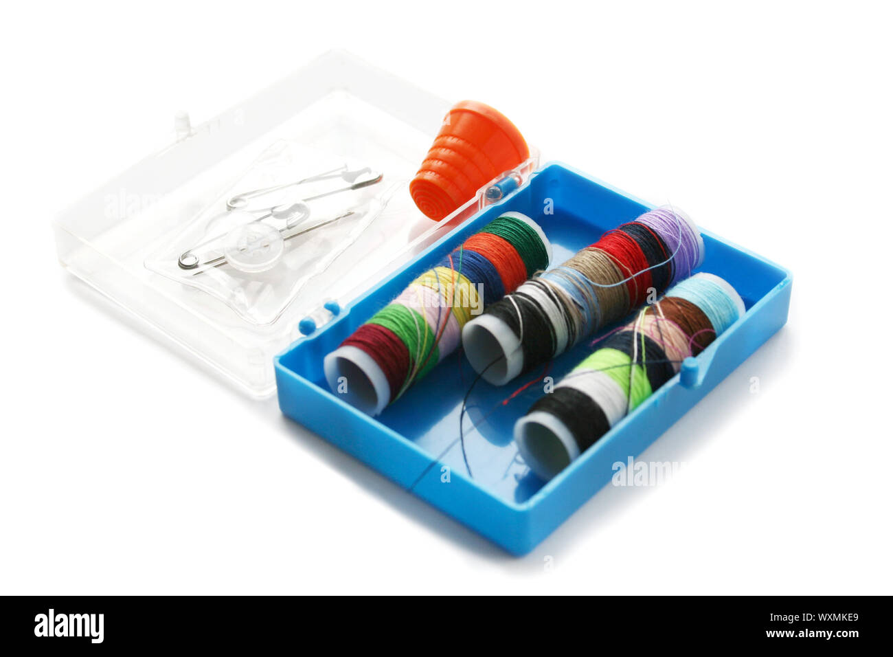 Little blue plastic box with emergency sewing supplies - needles, pins ...