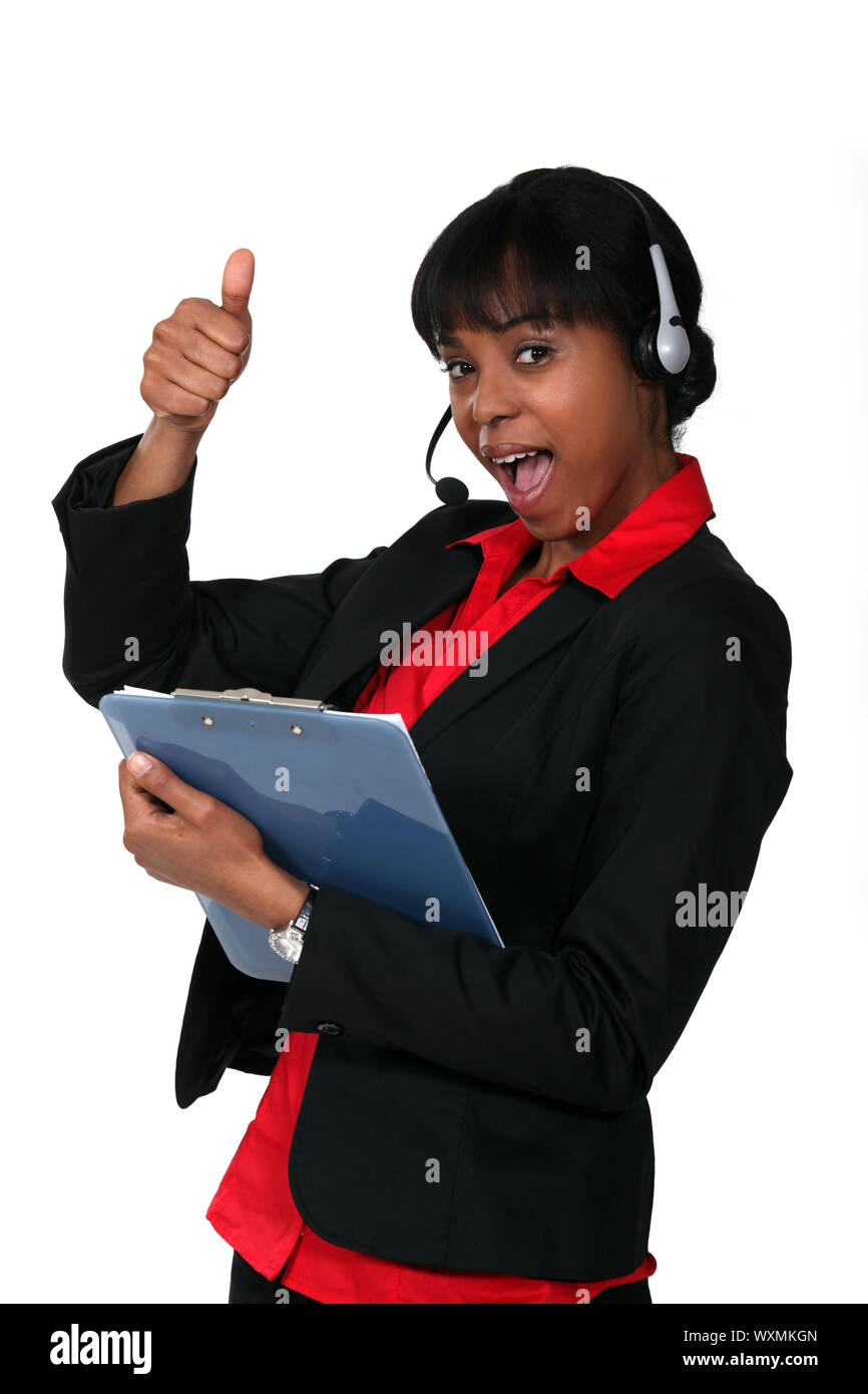 Call centre supervisor giving the thumb's up Stock Photo - Alamy