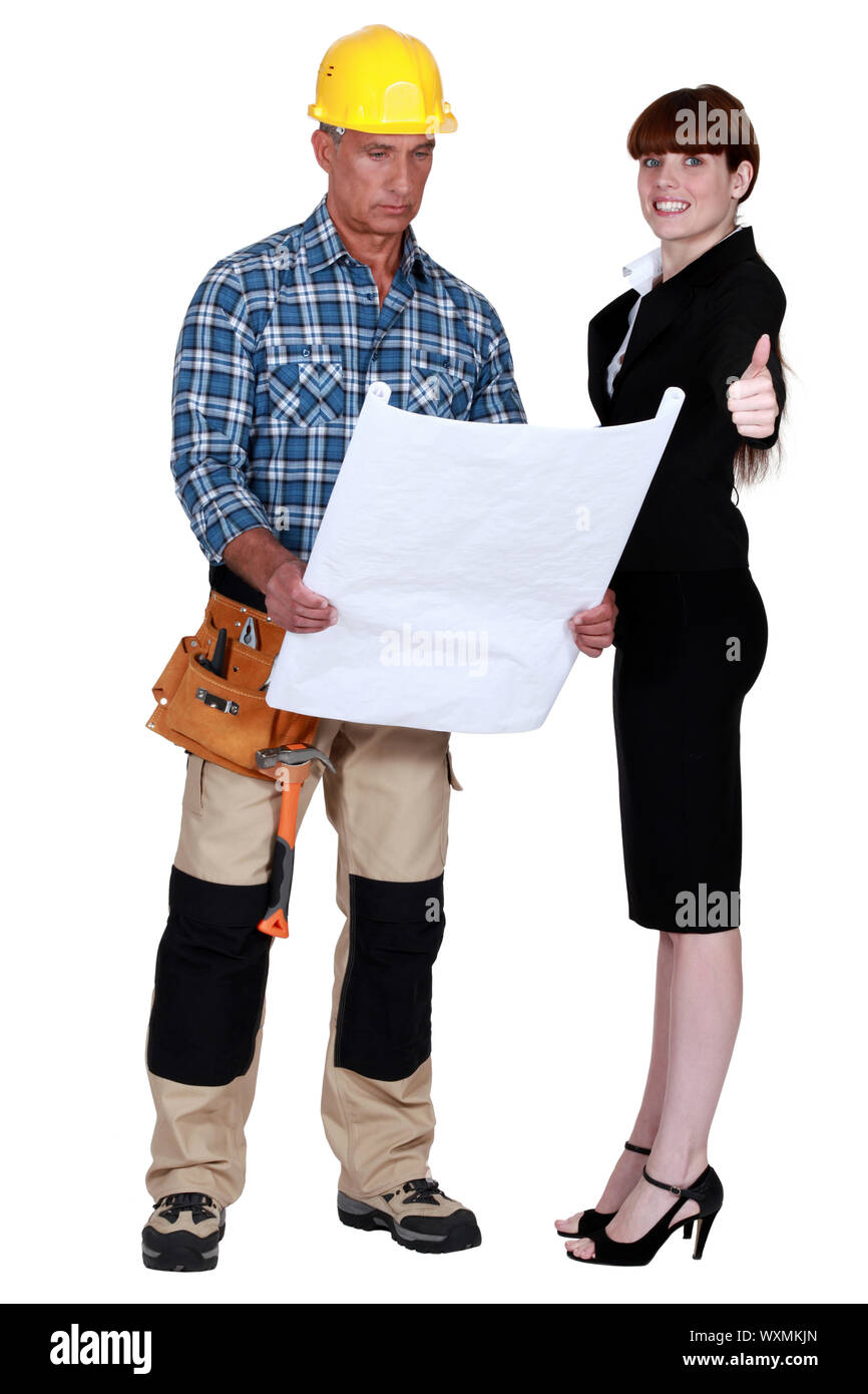 Architect and builder with plans Stock Photo - Alamy