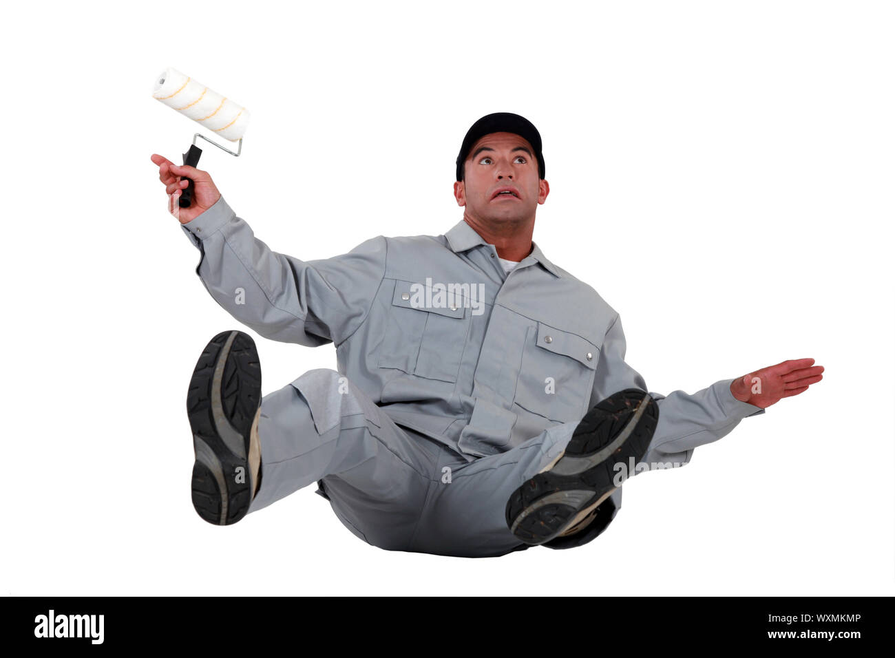 Painter slipping and falling Stock Photo - Alamy