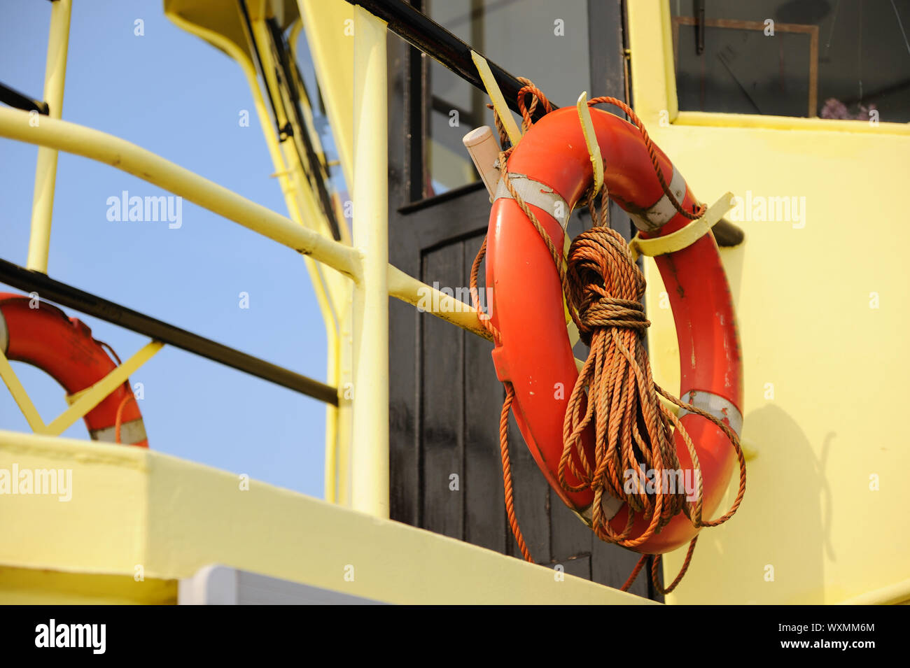 Life buoy at the boat Stock Photo - Alamy