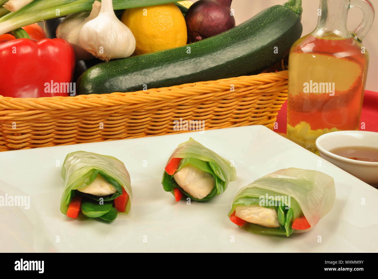 asian style chicken and vegetable bundles Stock Photo - Alamy