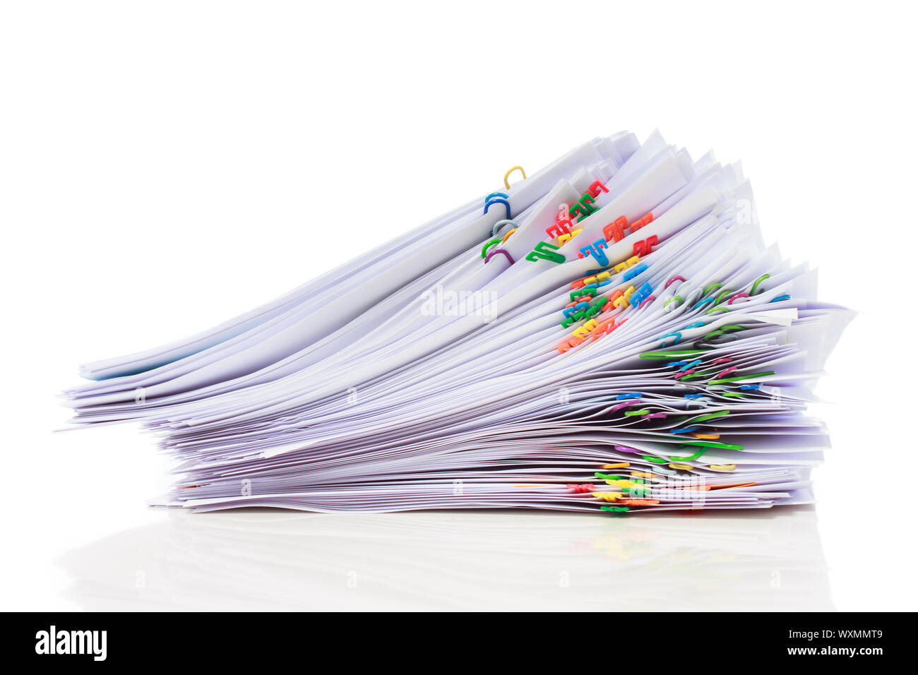 Stack of documents with colorful clips isolated on white background ...