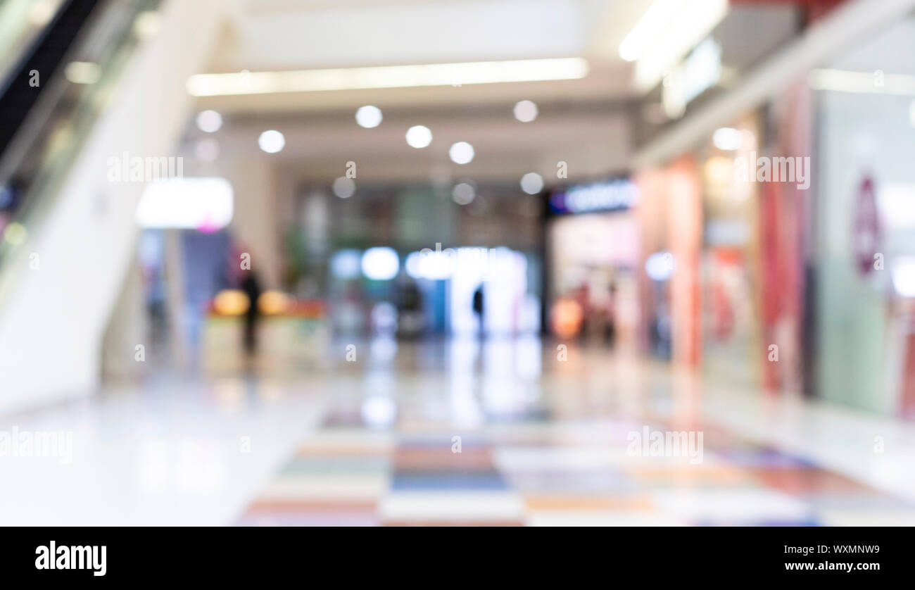 Blurred shopping mall, hall with retail stores Stock Photo - Alamy