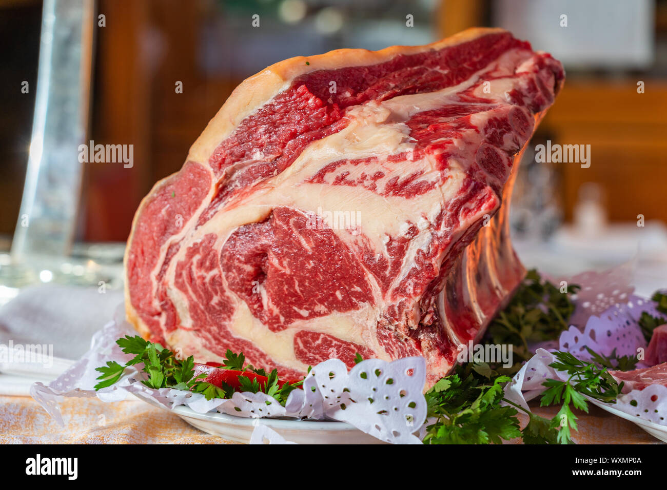 Fresh and raw beef ribs on plate in luxury restaurant Stock Photo - Alamy