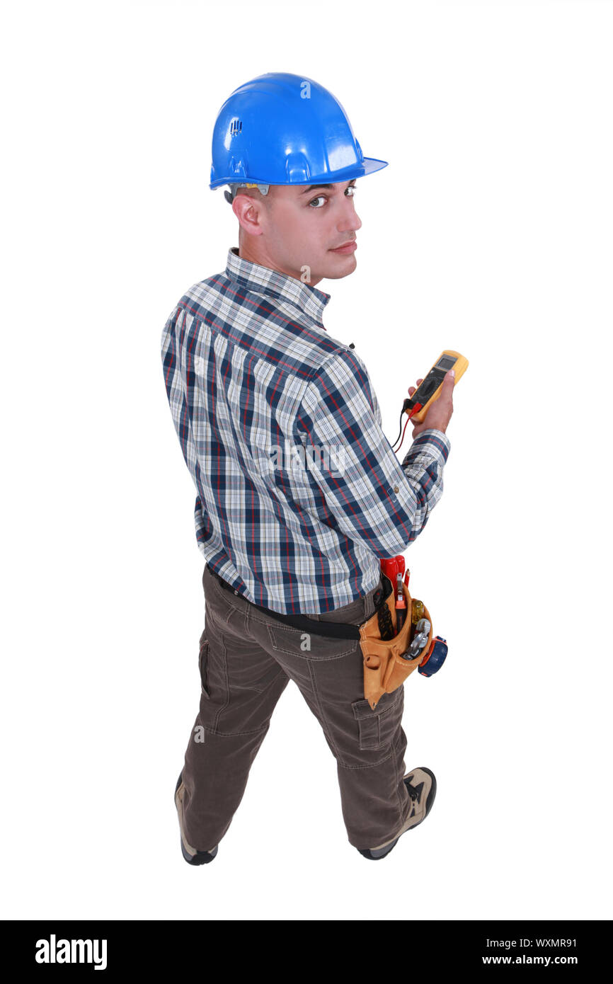 Man with a multimeter Stock Photo - Alamy