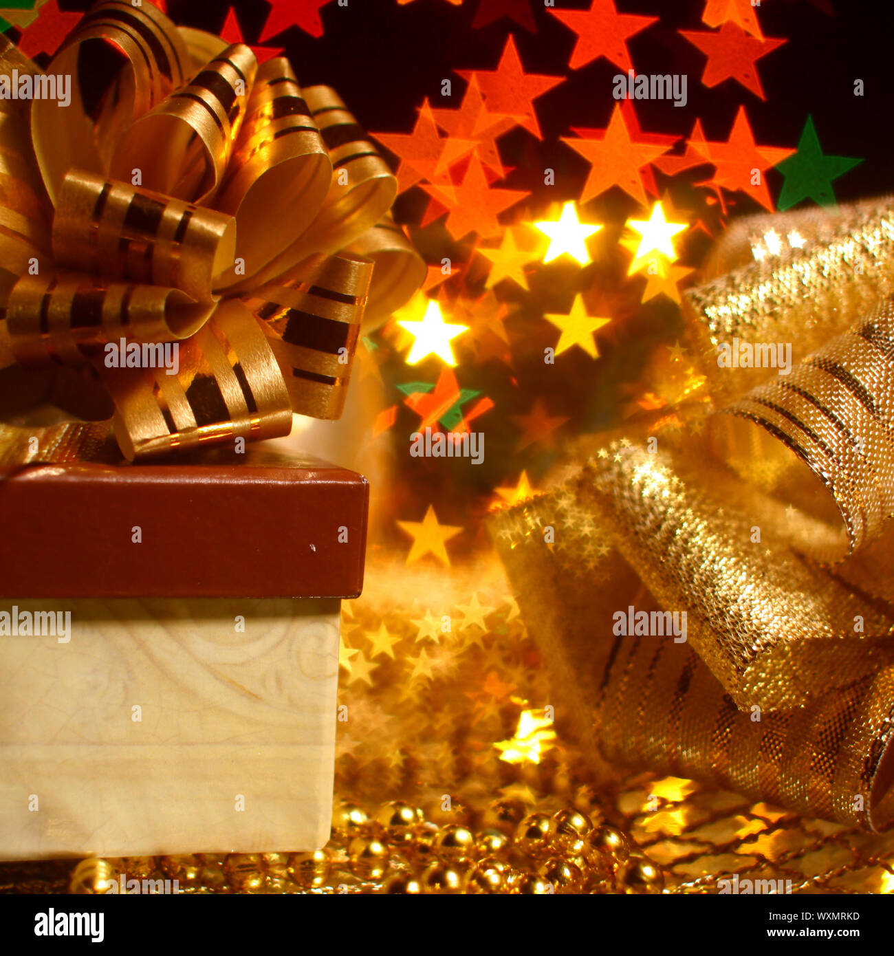 holiday gifts background warm stars Stock Photo - Alamy
