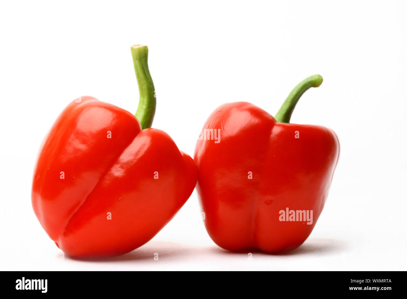 colored paprica isolated on white background Stock Photo - Alamy