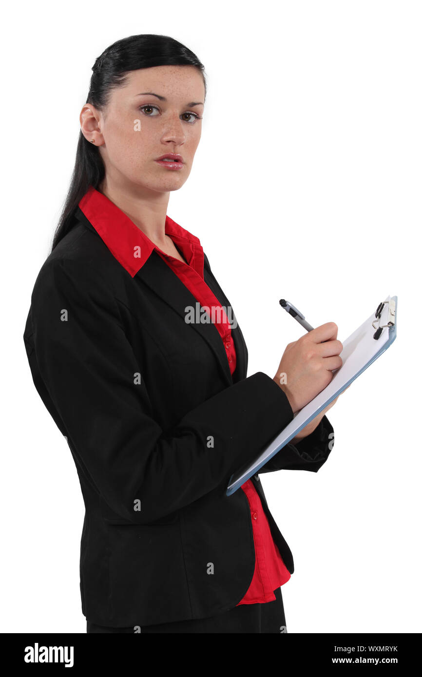 secretary writing on clipboard Stock Photo - Alamy