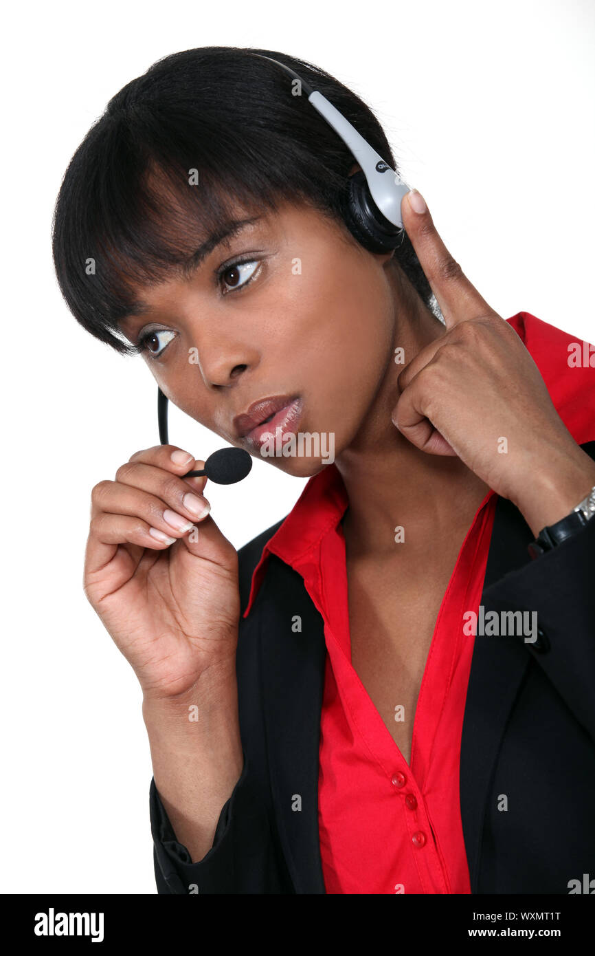 African American woman answering the hotline Stock Photo - Alamy