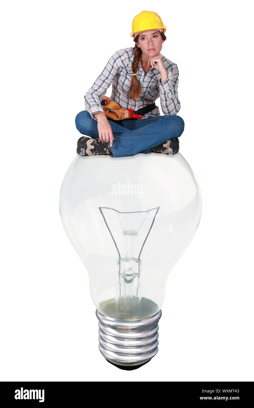 Woman light bulb thinking Cut Out Stock Images & Pictures - Alamy
