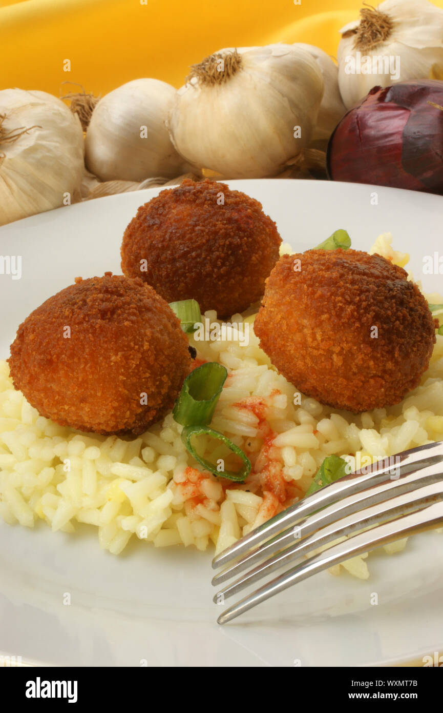 rissole with organic rice on a plate Stock Photo - Alamy