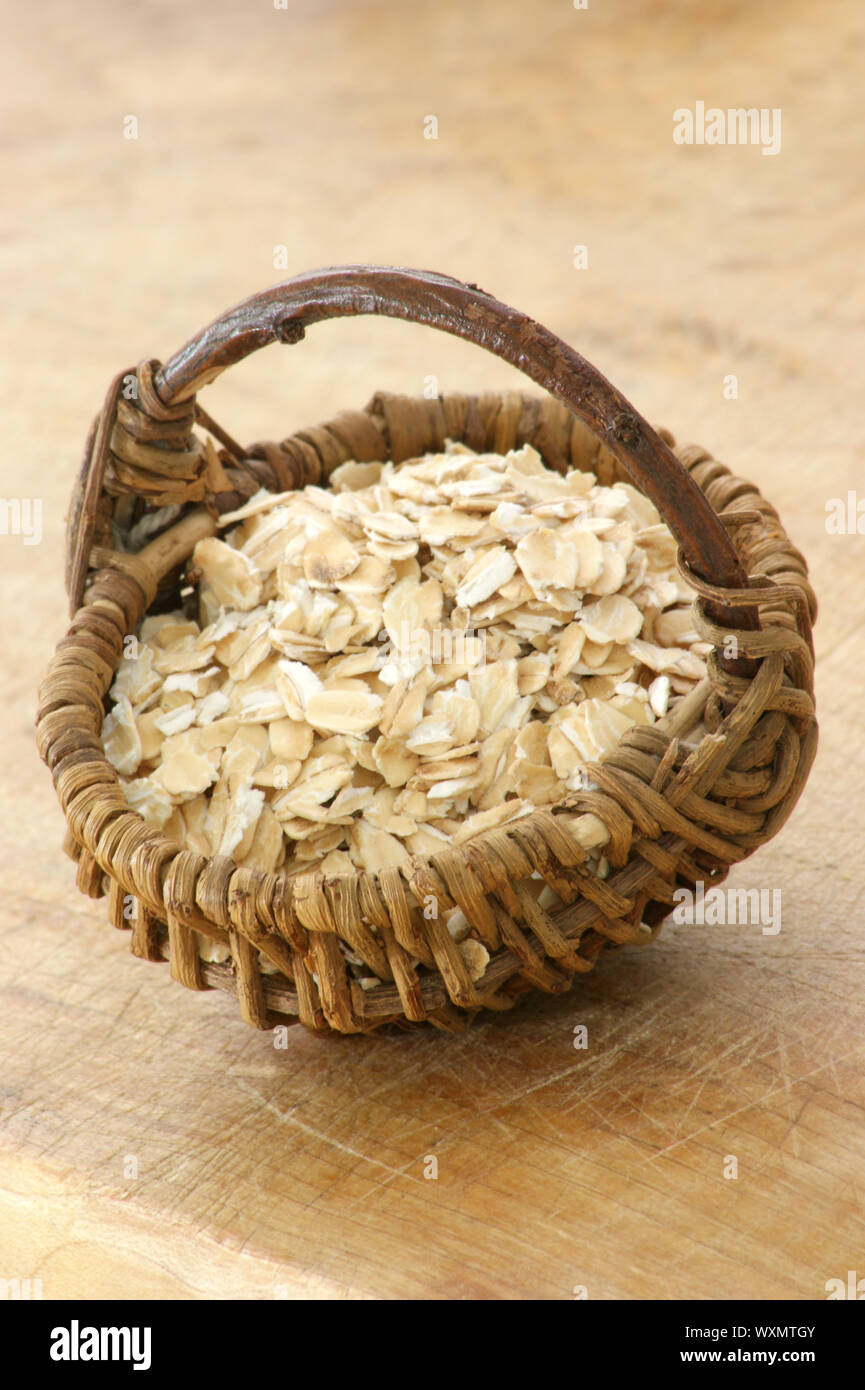 some organic raw porridge in a little basket Stock Photo - Alamy