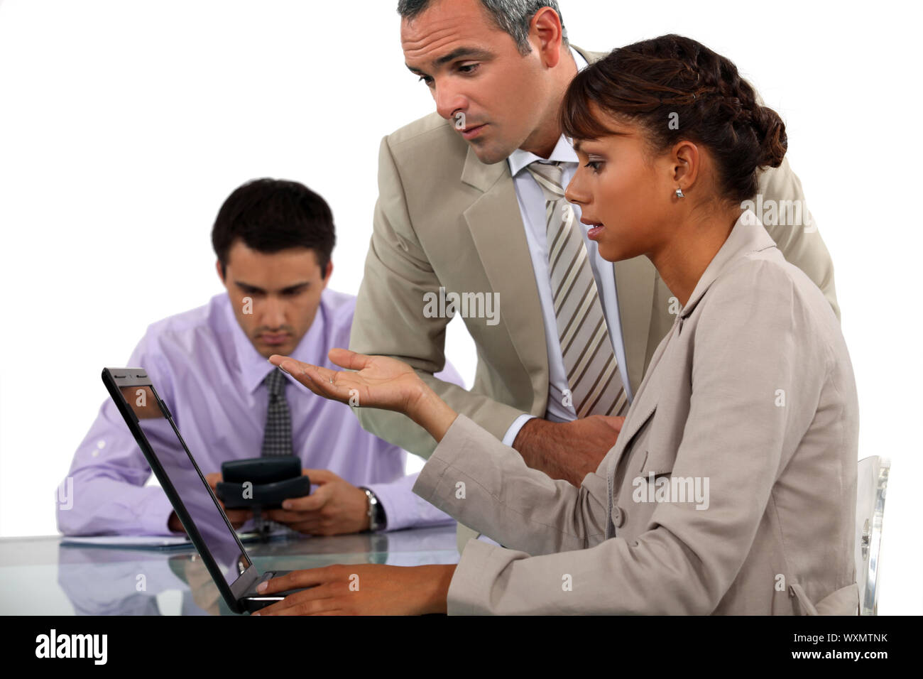 Office workers with a laptop Stock Photo - Alamy