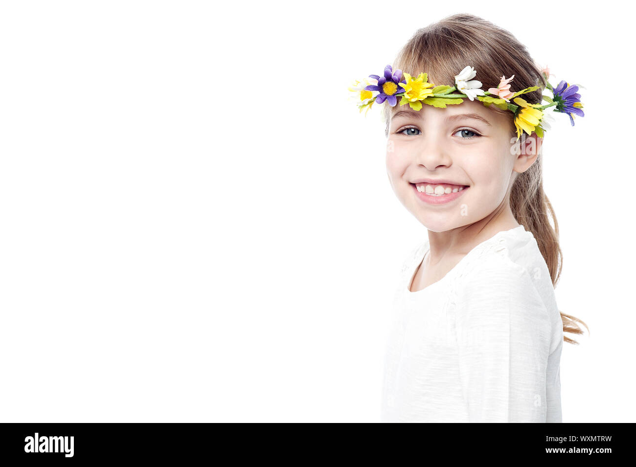 Cute isolated girl child wearing flower wreath Stock Photo - Alamy