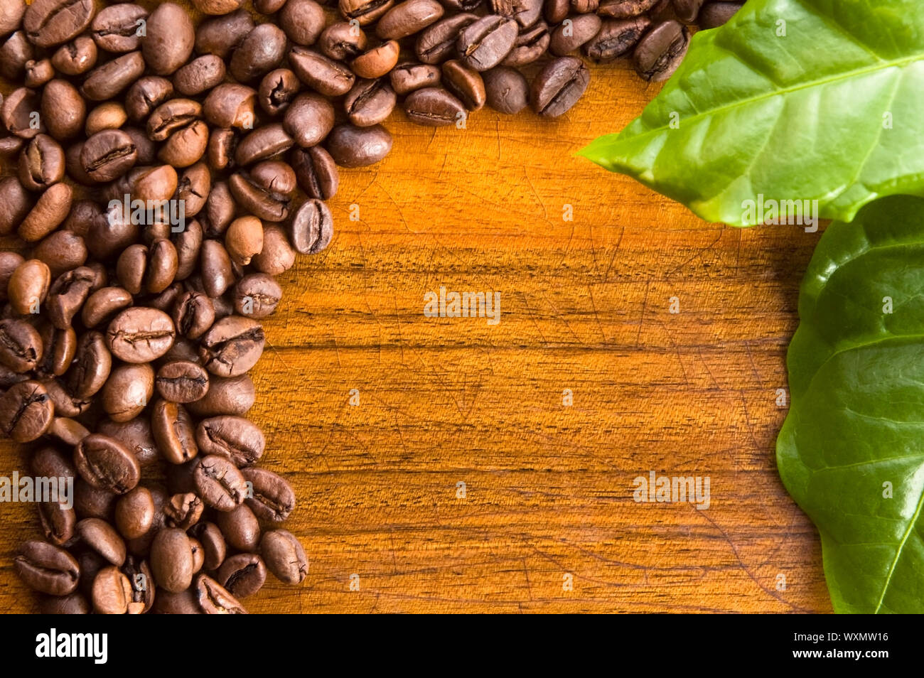 Coffee on wooden background Stock Photo - Alamy