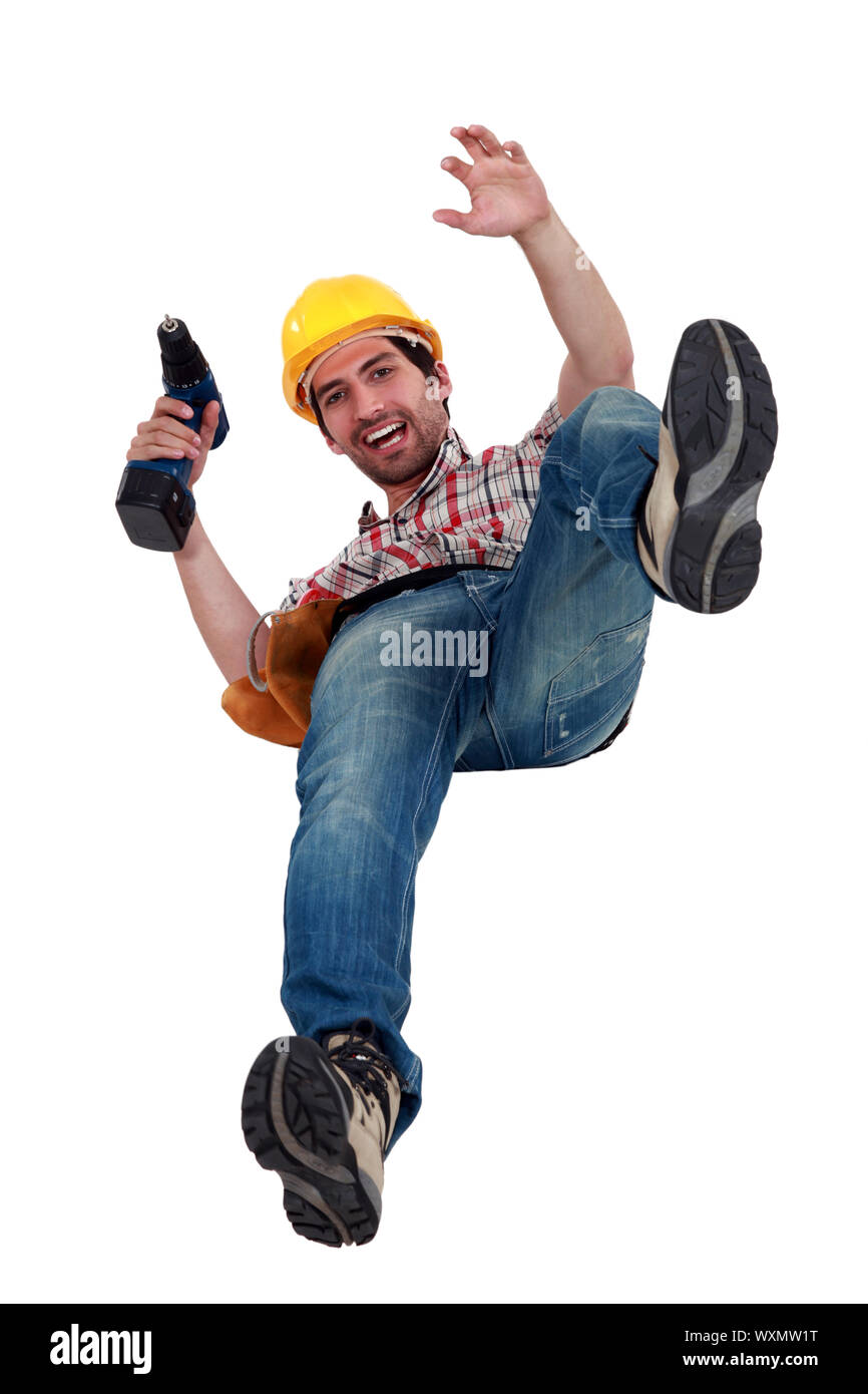 Manual worker falling Stock Photo - Alamy