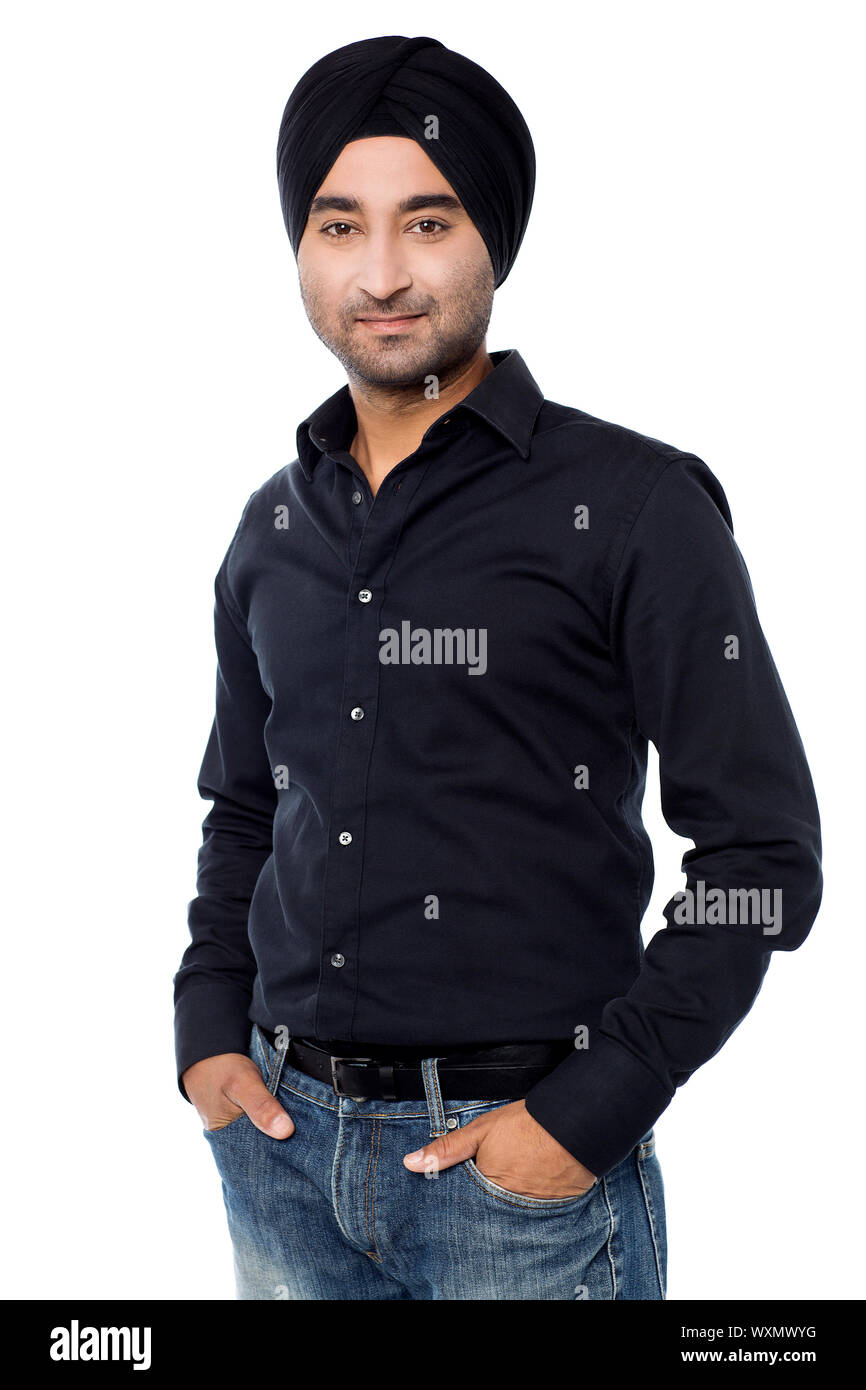 Handsome young Indian guy posing in style Stock Photo - Alamy
