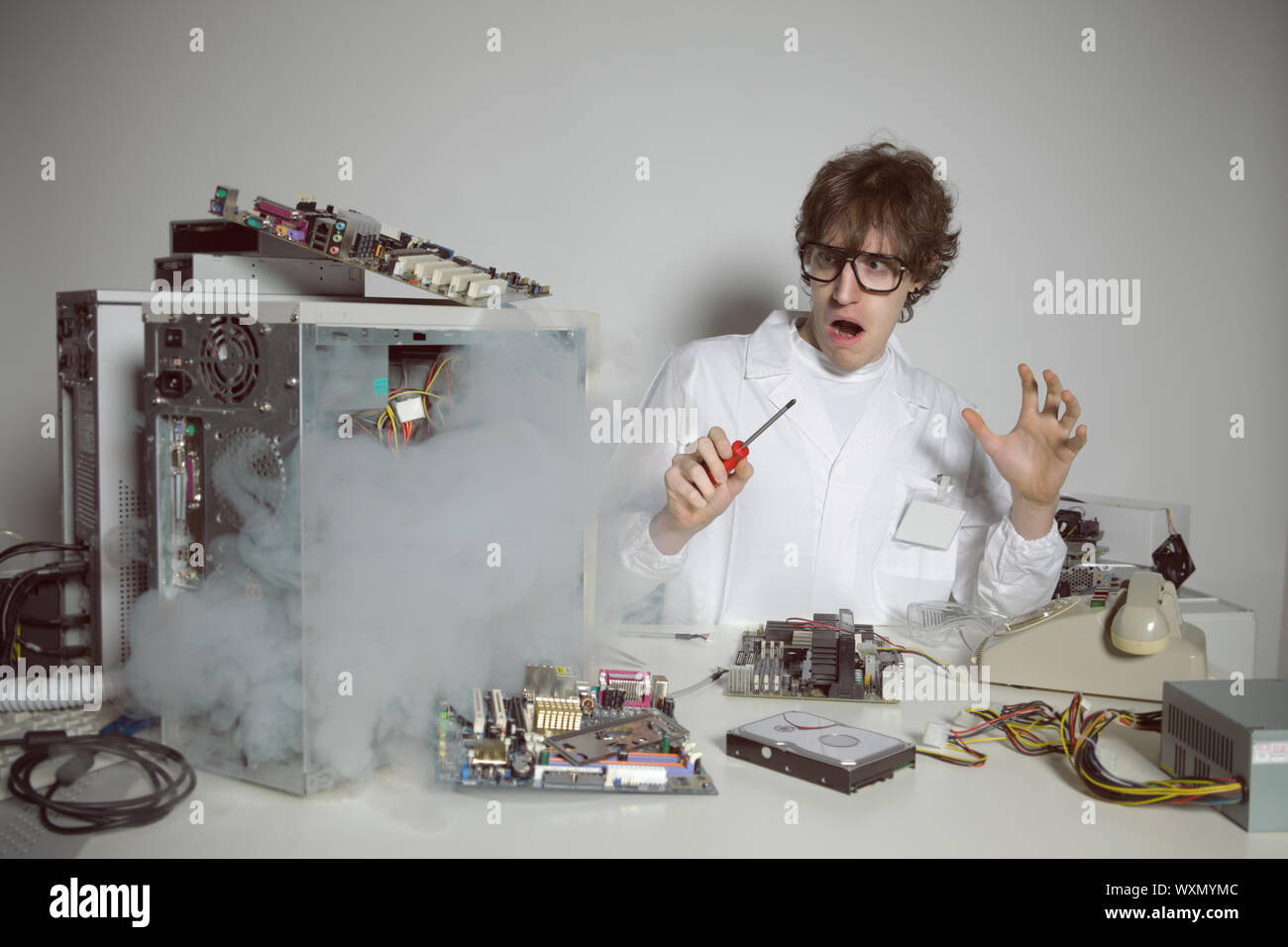Trying to repair computer hi-res stock photography and images - Alamy