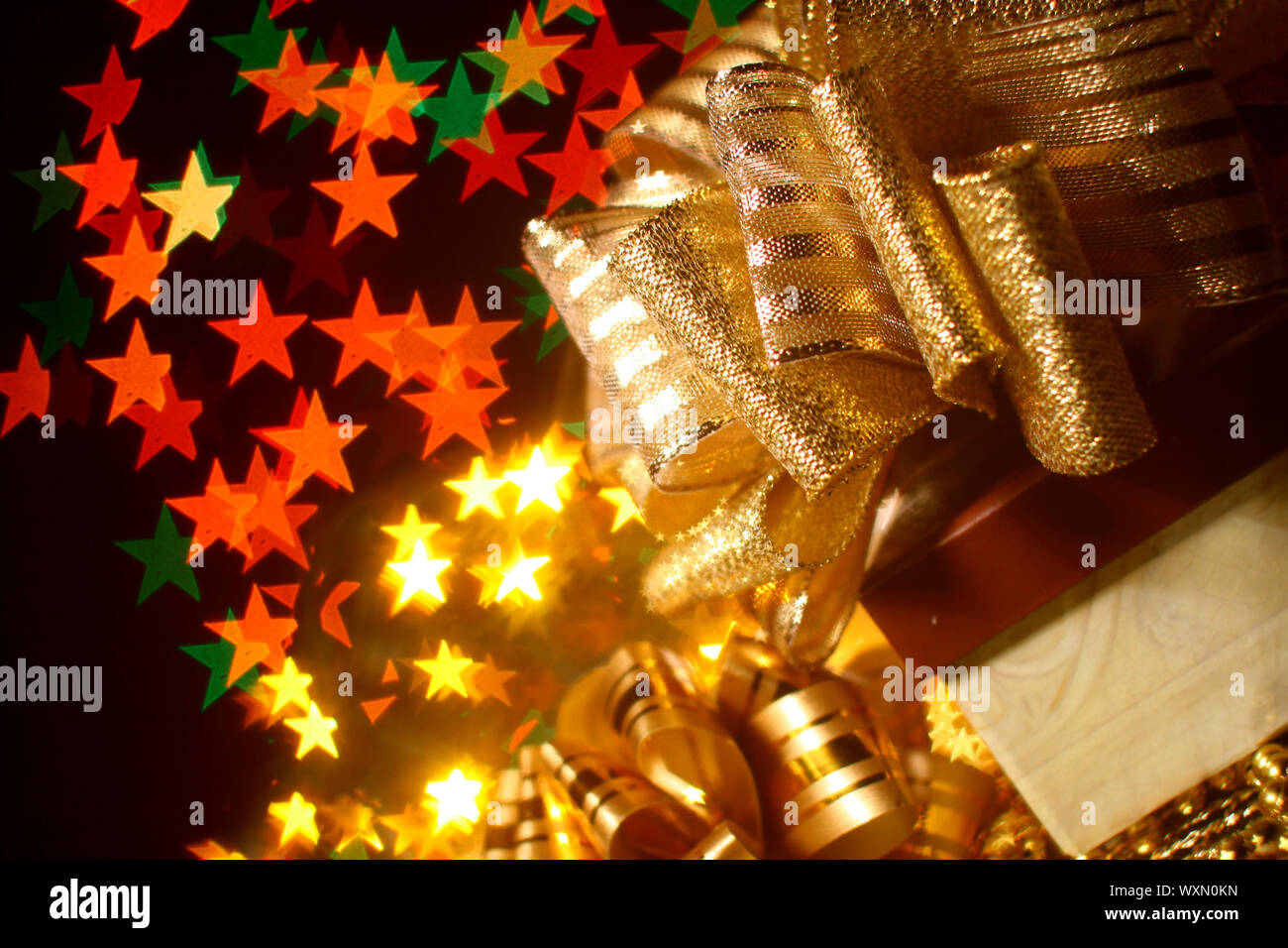 holiday gifts background warm stars Stock Photo - Alamy
