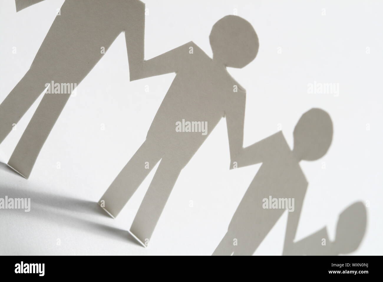paper team linked together partnership concept Stock Photo - Alamy paper team linked together partnership concept Stock Photo - Alamy
