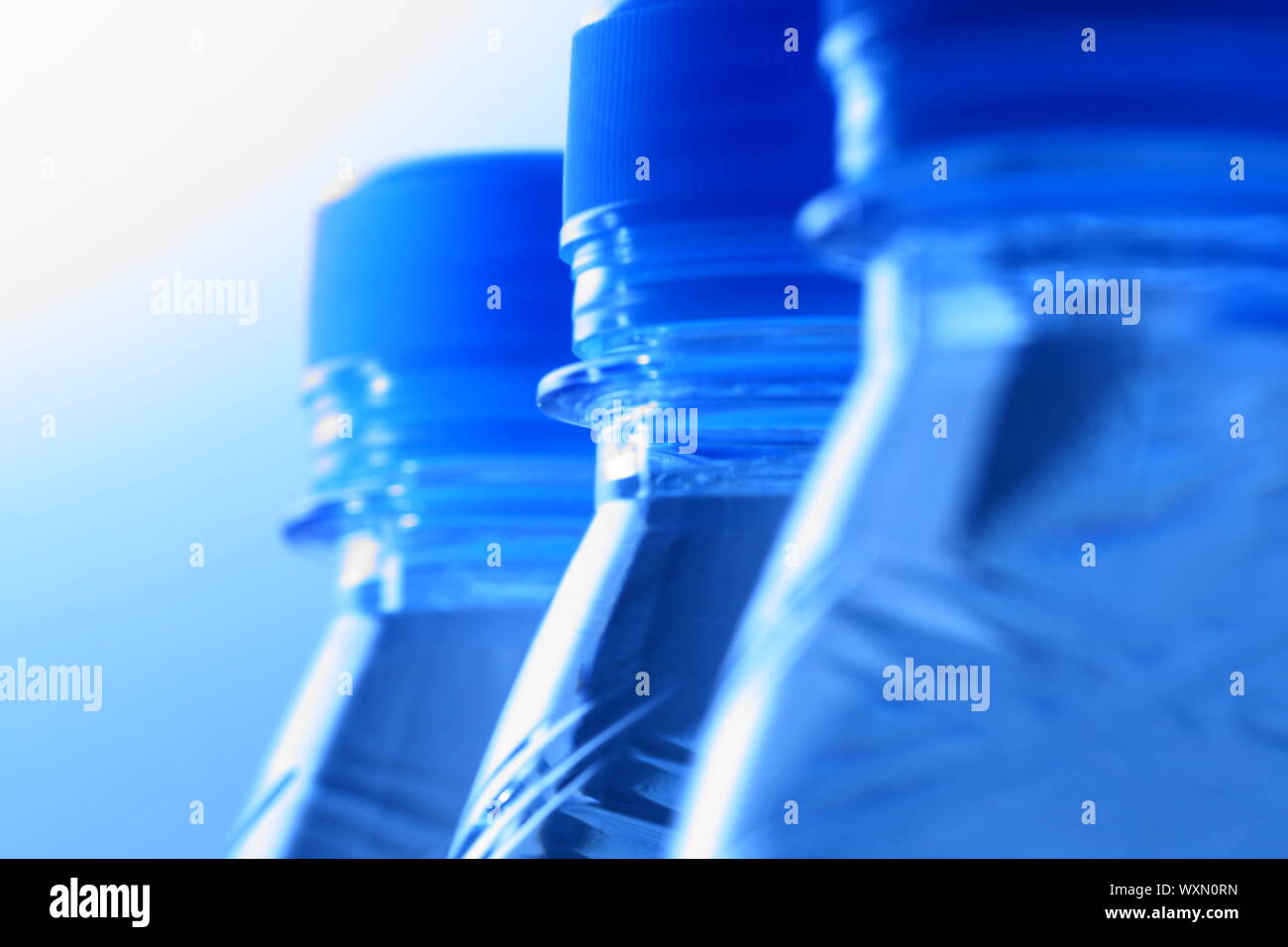 clear cold blue water in bottle Stock Photo - Alamy