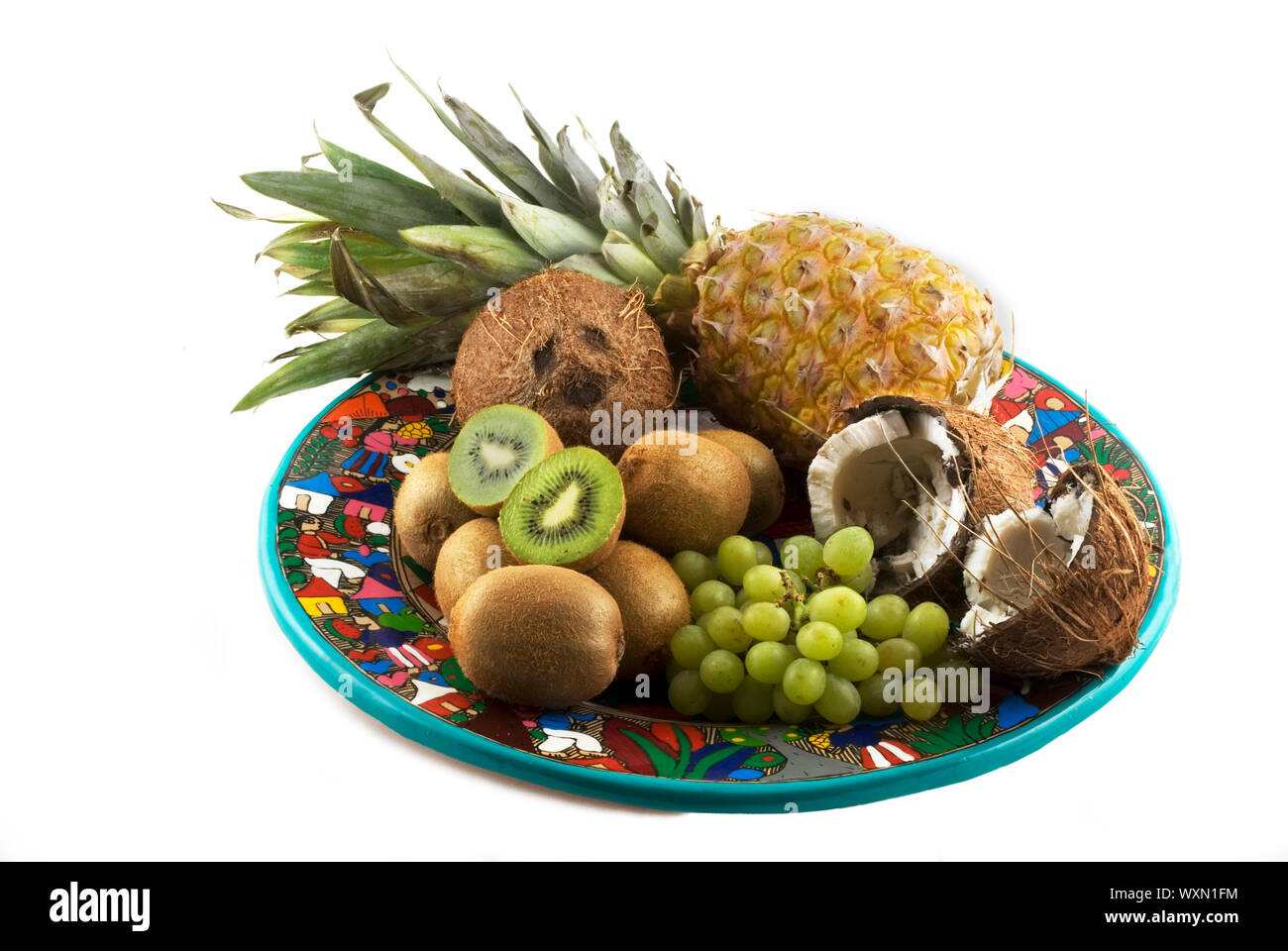 assortment of tropical fruit on a Mexican plate Stock Photo - Alamy