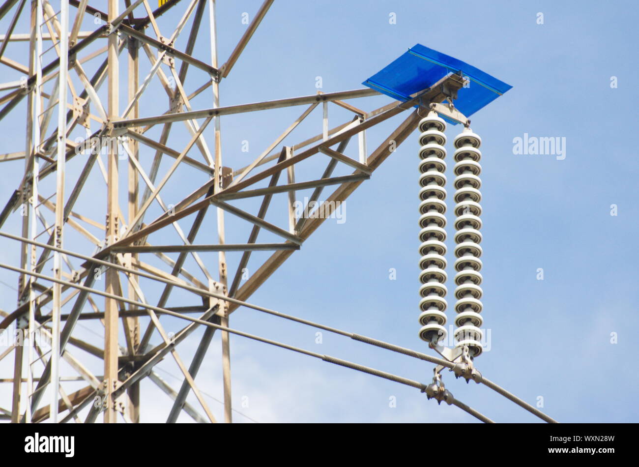 Insulators for securing power cables to high voltage electricity poles ...