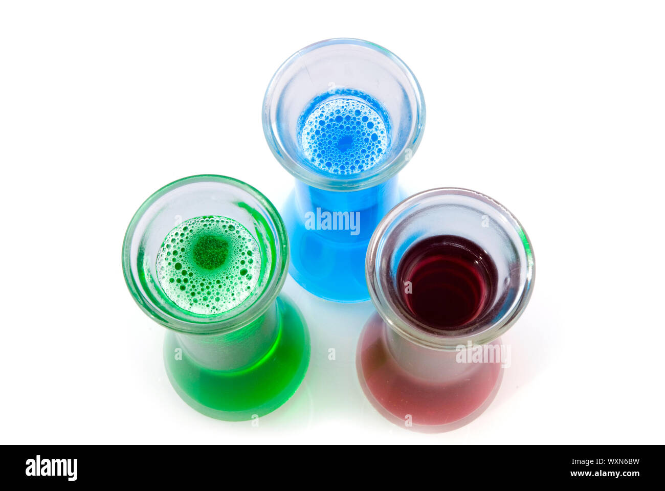 laboratory with three colors liquids in glass Stock Photo - Alamy