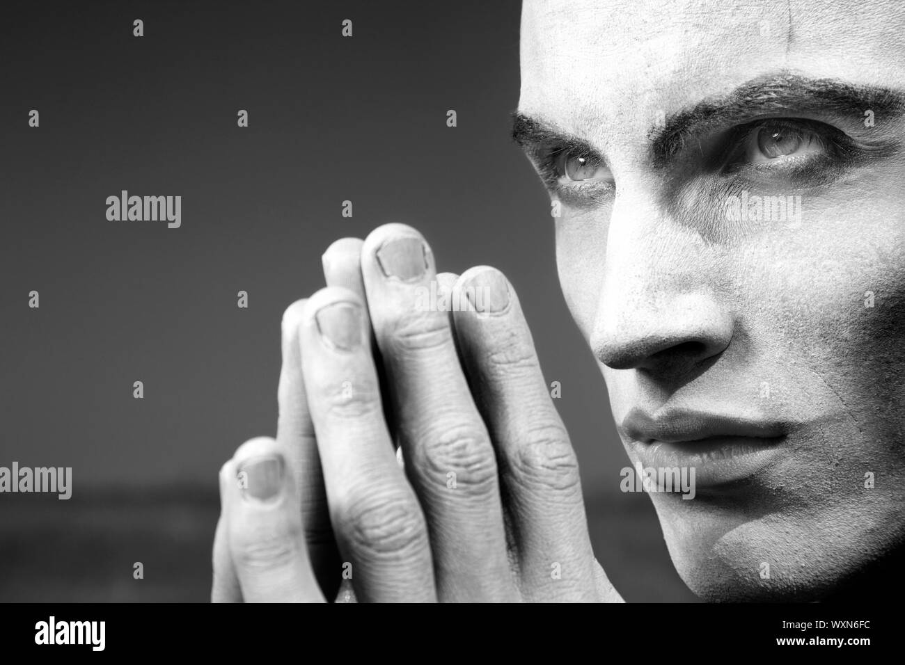 Angry vampire outdoors. Monochrome photo with special dramatic darkness ...