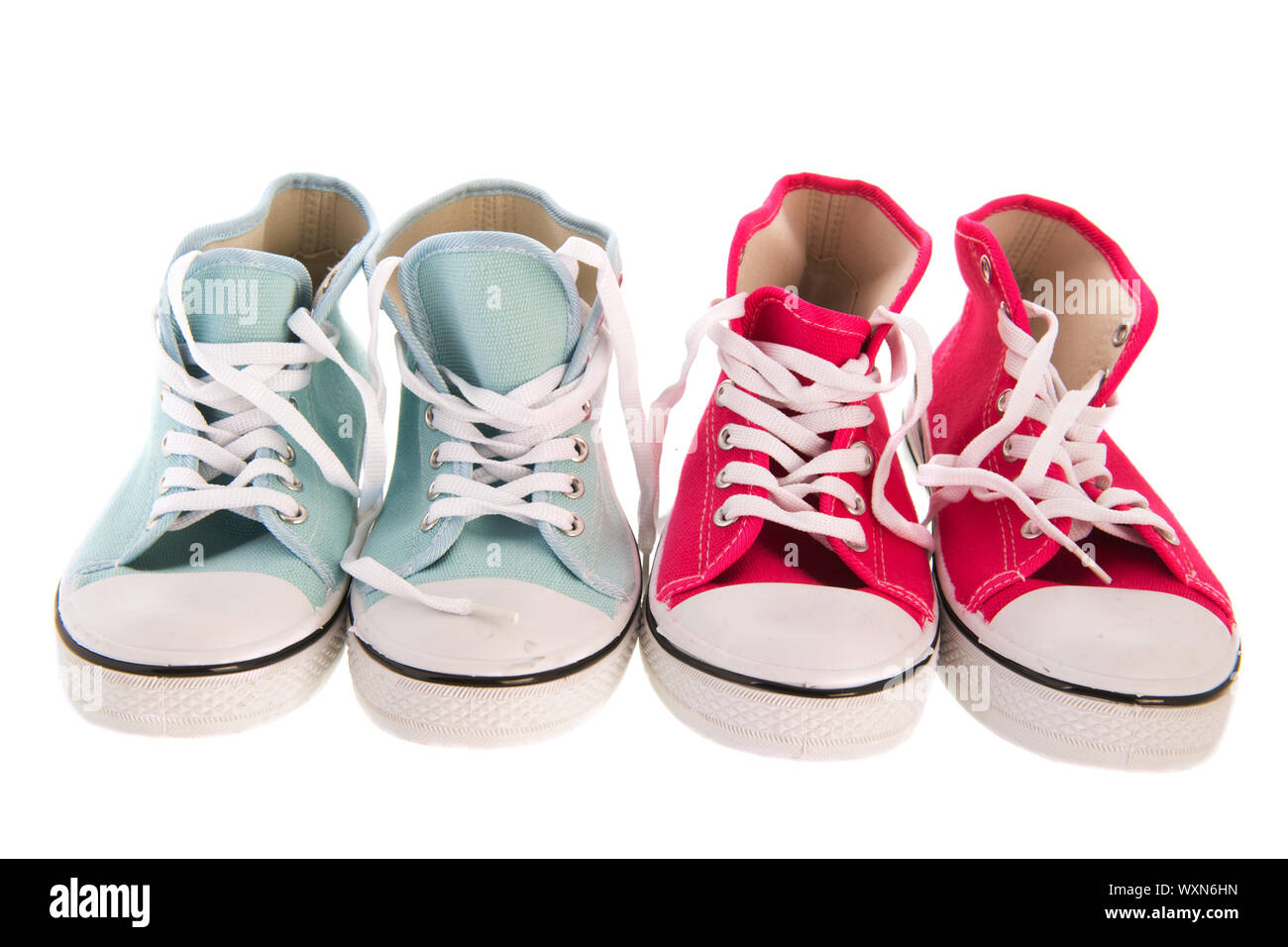 Basketball shoes in pink and blue Stock Photo - Alamy