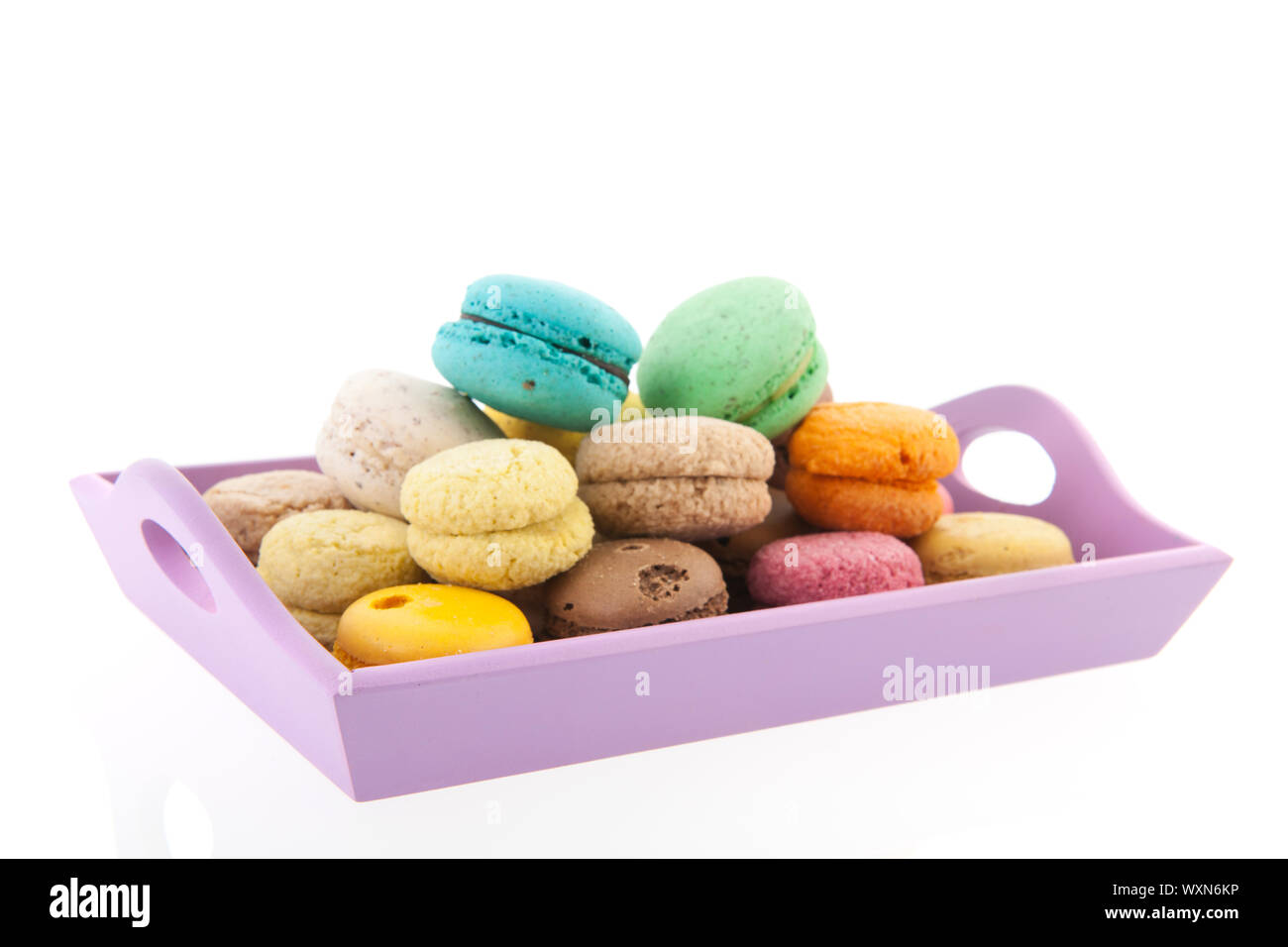 Colorful tray French macaroons isolated over white background Stock ...
