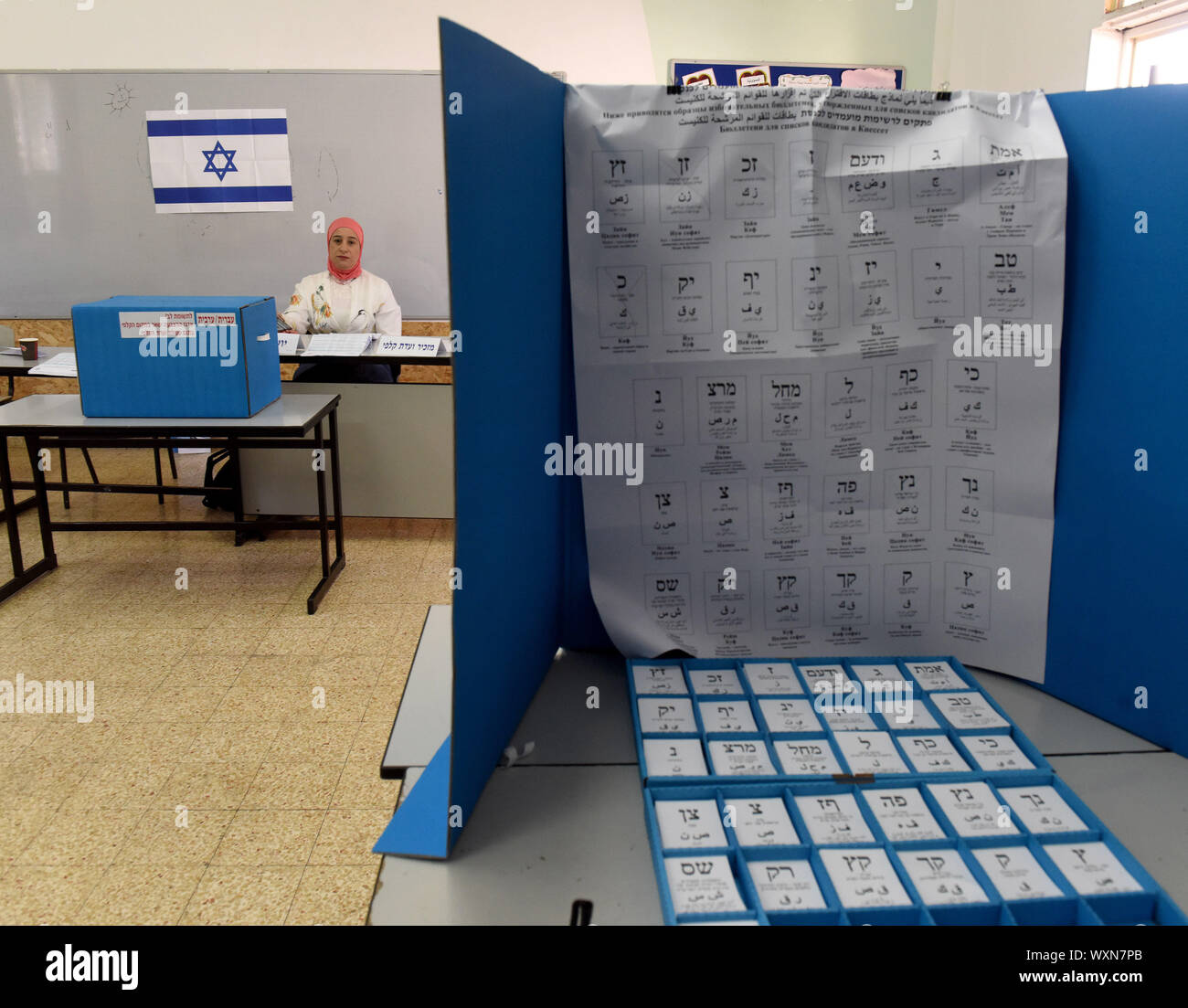 Jerusalem, Israel. 17th Sep 2019. An Israeli Arab waits for people to ...