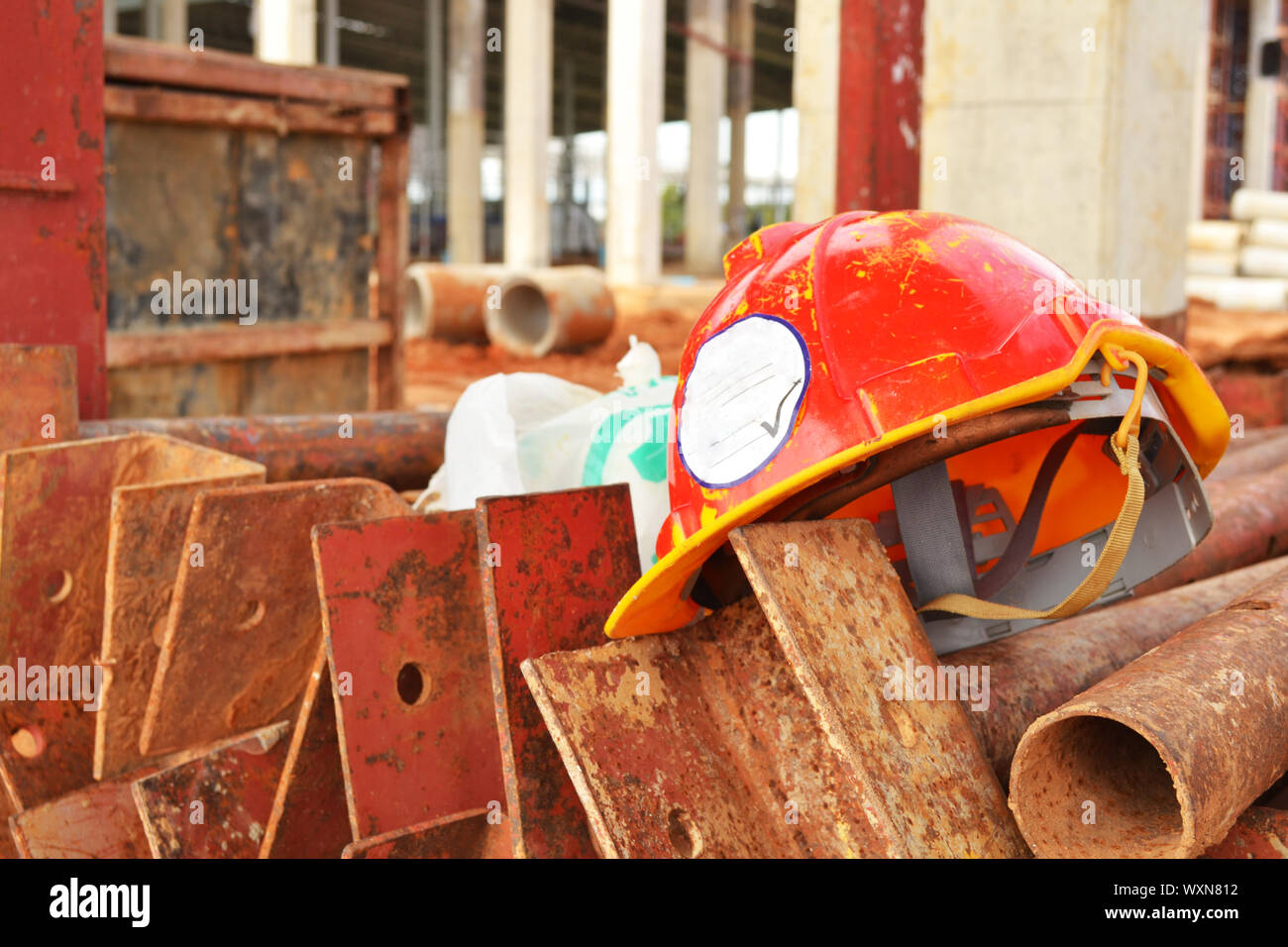 Hat engineers in construction Stock Photo - Alamy